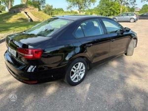 Black Volkswagen Jetta 2024 in Kaunas, with an engine capacity of 1.40 L and mileage of 187 thousand km for 6800 €, photo 5 on AUTOMOTO.COM.LV