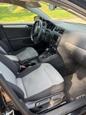 Black Volkswagen Jetta 2024 in Kaunas, with an engine capacity of 1.40 L and mileage of 187 thousand km for 6800 €, photo 7 on AUTOMOTO.COM.LV