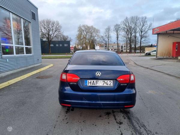 Zils Volkswagen Jetta 2011 Tauragė, ar dzinēja tilpumu 2.50 L un nobraukumu 155 tūkst. km par 2950 €, foto 5 vietnē AUTOMOTO.COM.LV
