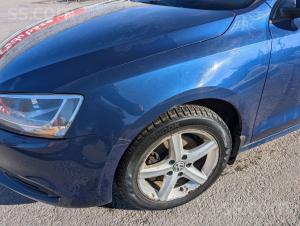 Zils Volkswagen Jetta 2013 Rīga, ar dzinēja tilpumu 1.40 L un nobraukumu 219 tūkst. km par 3700 €, foto 9 vietnē AUTOMOTO.COM.LV