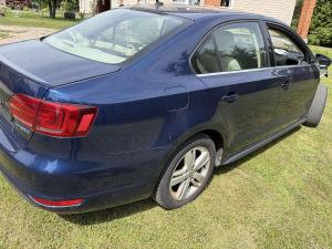Blue Volkswagen Jetta 2013 in Marijampole, with an engine capacity of 1.40 L and mileage of 21 thousand km for 3650 €, photo 3 on AUTOMOTO.COM.LV