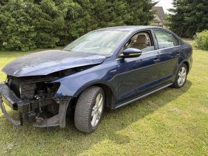 Blue Volkswagen Jetta 2013 in Marijampole, with an engine capacity of 1.40 L and mileage of 21 thousand km for 3650 €, photo 4 on AUTOMOTO.COM.LV