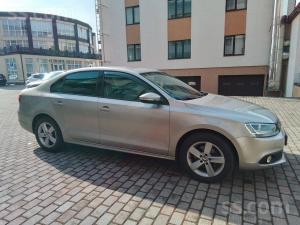 Brūns Volkswagen Jetta 2012 Rīga, ar dzinēja tilpumu 1.40 L un nobraukumu 0 tūkst. km par 4750 €, foto 8 vietnē AUTOMOTO.COM.LV