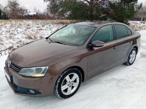 Brown Volkswagen Jetta 2014 in Valmiera, with an engine capacity of 1.40 L and mileage of 165 thousand km for 5600 €, photo  on AUTOMOTO.COM.LV