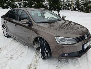 Brown Volkswagen Jetta 2014 in Vilnius, with an engine capacity of 1.39 L and mileage of 172 thousand km for 6300 €, photo 5 on AUTOMOTO.COM.LV