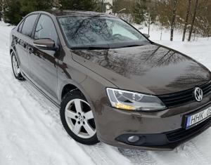 Brown Volkswagen Jetta 2014 in Vilnius, with an engine capacity of 1.39 L and mileage of 172 thousand km for 6300 €, photo 11 on AUTOMOTO.COM.LV