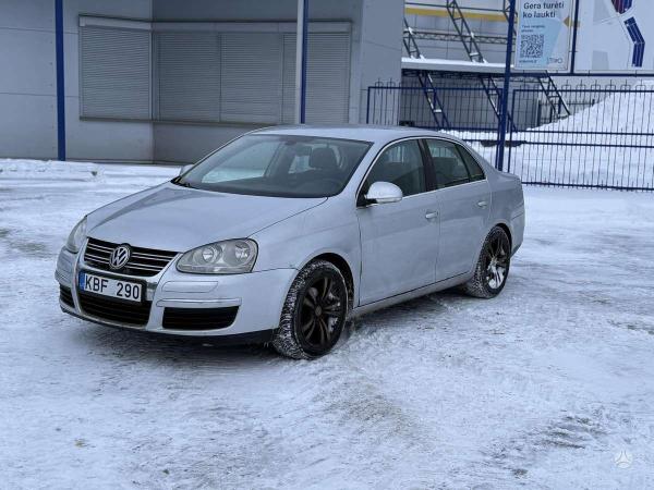 Grey Volkswagen Jetta 2006 in Vilnius, with an engine capacity of 1.98 L and mileage of 200 thousand km for 999 €, photo 1 on AUTOMOTO.COM.LV