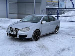 Grey Volkswagen Jetta 2006 in Vilnius, with an engine capacity of 1.98 L and mileage of 200 thousand km for 999 €, photo  on AUTOMOTO.COM.LV
