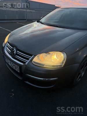 Grey Volkswagen Jetta 2008 in Riga, with an engine capacity of 1.90 L and mileage of 413 thousand km for 1900 €, photo 14 on AUTOMOTO.COM.LV