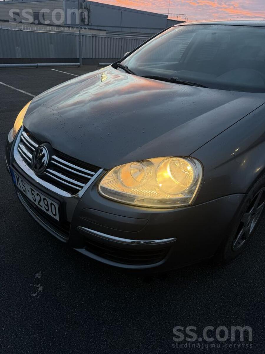 Grey Volkswagen Jetta 2008 in Riga, with an engine capacity of 1.90 L and mileage of 413 thousand km for 1900 €, photo 14 on AUTOMOTO.COM.LV