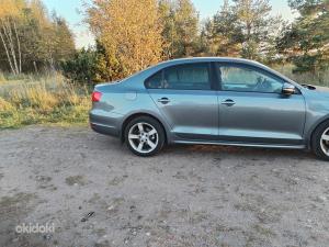 Grey Volkswagen Jetta 2011 in Tallinn, with an engine capacity of 1.40 L and mileage of 262 thousand km for 3900 €, photo 14 on AUTOMOTO.COM.LV
