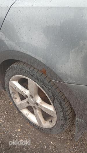 Grey Volkswagen Jetta 2011 in Tallinn, with an engine capacity of 1.40 L and mileage of 262 thousand km for 3900 €, photo 15 on AUTOMOTO.COM.LV