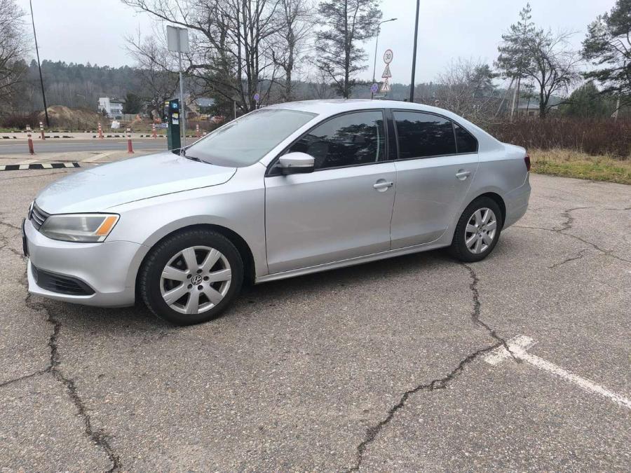 Grey Volkswagen Jetta 2014 in Vilnius, with an engine capacity of 1.80 L and mileage of 182 thousand km for 3700 €, photo 11 on AUTOMOTO.COM.LV