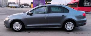 Grey Volkswagen Jetta 2014 in Vilnius, with an engine capacity of 1.60 L and mileage of 255 thousand km for 3950 €, photo 8 on AUTOMOTO.COM.LV