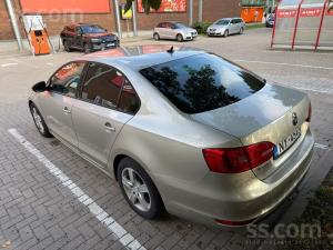 Pelēks Volkswagen Jetta 2014 Rīga, ar dzinēja tilpumu 1.40 L un nobraukumu 358 tūkst. km par 2500 €, foto 7 vietnē AUTOMOTO.COM.LV