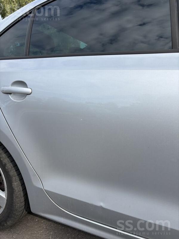 Grey Volkswagen Jetta 2015 in Jurmala, with an engine capacity of 1.40 L and mileage of 188 thousand km for 4900 €, photo 9 on AUTOMOTO.COM.LV