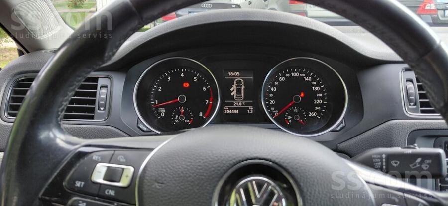 Grey Volkswagen Jetta 2015 in Ventspils, with an engine capacity of 1.40 L and mileage of 205 thousand km for 3999 €, photo 7 on AUTOMOTO.COM.LV