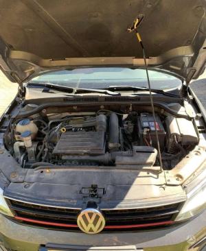 Grey Volkswagen Jetta 2017 in Klaipeda, with an engine capacity of 1.40 L and mileage of 125 thousand km for 6200 €, photo 14 on AUTOMOTO.COM.LV