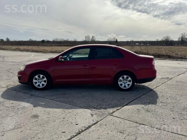 Red Volkswagen Jetta 2006 in Riga, with an engine capacity of 1.60 L and mileage of 0 thousand km for 1699 €, photo 2 on AUTOMOTO.COM.LV