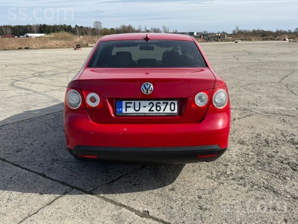 Red Volkswagen Jetta 2006 in Riga, with an engine capacity of 1.60 L and mileage of 0 thousand km for 1699 €, photo 4 on AUTOMOTO.COM.LV