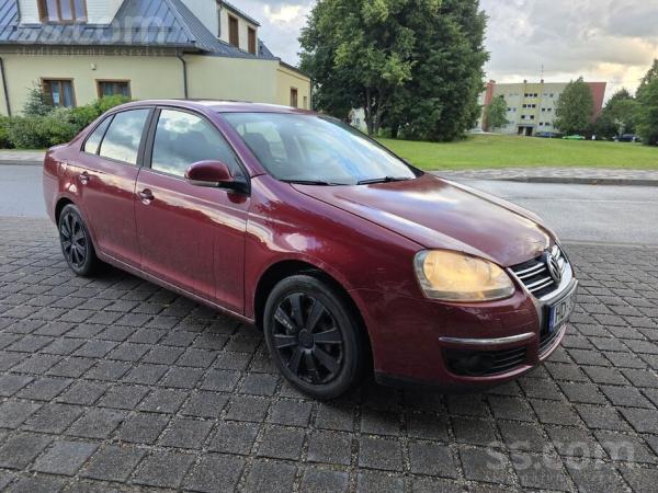 Sarkans Volkswagen Jetta 2008 Rīga, ar dzinēja tilpumu 1.60 L un nobraukumu 148 tūkst. km par 1950 €, foto 2 vietnē AUTOMOTO.COM.LV