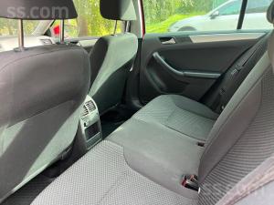 Sarkans Volkswagen Jetta 2014 Rīga, ar dzinēja tilpumu 1.40 L un nobraukumu 179 tūkst. km par 4400 €, foto 12 vietnē AUTOMOTO.COM.LV