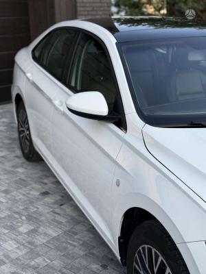 White Volkswagen Jetta 2019 in Kaunas, with an engine capacity of 1.40 L and mileage of 59 thousand km for 11400 €, photo 6 on AUTOMOTO.COM.LV