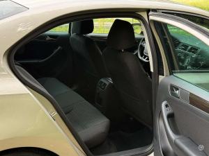 Yellow Volkswagen Jetta 2015 in Alytus, with an engine capacity of 1.97 L and mileage of 255 thousand km for 6499 €, photo 24 on AUTOMOTO.COM.LV