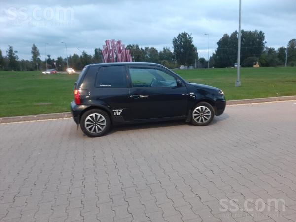 Black Volkswagen Lupo 2000 in Riga, with an engine capacity of 1.40 L and mileage of 238 thousand km for 1350 €, photo 3 on AUTOMOTO.COM.LV