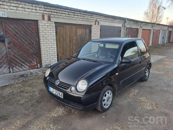 Melns Volkswagen Lupo 2002 Rīga, ar dzinēja tilpumu 1.00 L un nobraukumu 194 tūkst. km par 1150 €, foto 1 vietnē AUTOMOTO.COM.LV