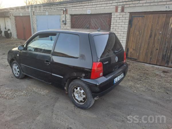 Melns Volkswagen Lupo 2002 Rīga, ar dzinēja tilpumu 1.00 L un nobraukumu 194 tūkst. km par 1150 €, foto 3 vietnē AUTOMOTO.COM.LV