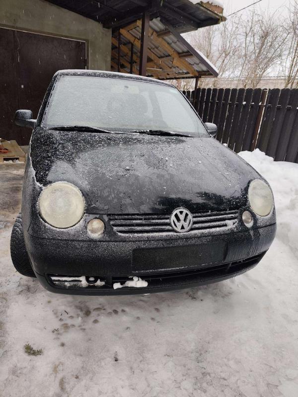 Black Volkswagen Lupo 2000 in Vilnius, with an engine capacity of 1.40 L and mileage of 213 thousand km for 1000 €, photo 5 on AUTOMOTO.COM.LV
