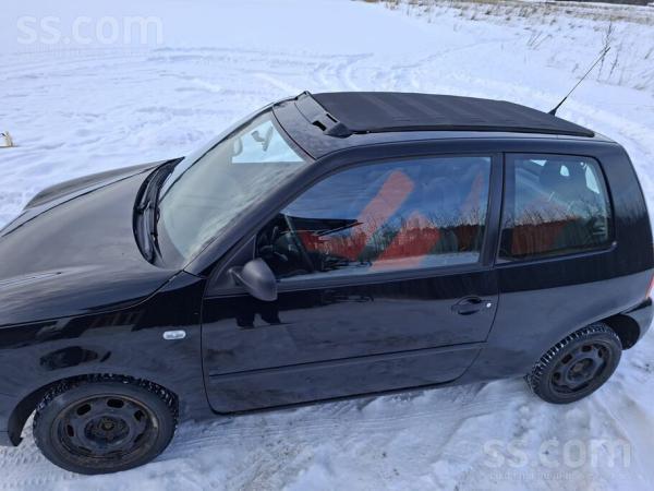Black Volkswagen Lupo 2000 in Valmiera, with an engine capacity of 1.00 L and mileage of 203 thousand km for 950 €, photo 1 on AUTOMOTO.COM.LV
