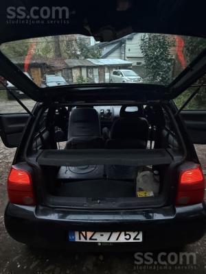 Black Volkswagen Lupo 2000 in Riga, with an engine capacity of 1.60 L and mileage of 183 thousand km for 1300 €, photo 7 on AUTOMOTO.COM.LV