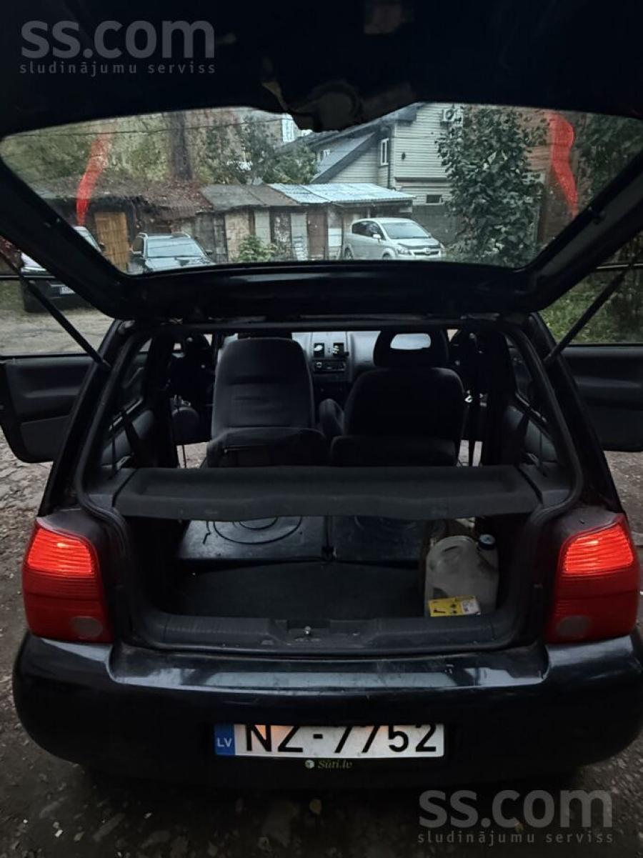 Black Volkswagen Lupo 2000 in Riga, with an engine capacity of 1.60 L and mileage of 183 thousand km for 1300 €, photo 7 on AUTOMOTO.COM.LV