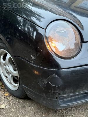 Black Volkswagen Lupo 2000 in Riga, with an engine capacity of 1.60 L and mileage of 183 thousand km for 1300 €, photo 12 on AUTOMOTO.COM.LV