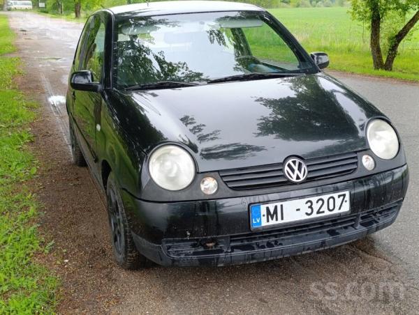 Melns Volkswagen Lupo 2001 Jēkabpils, ar dzinēja tilpumu 1.40 L un nobraukumu 204 tūkst. km par 990 €, foto 1 vietnē AUTOMOTO.COM.LV