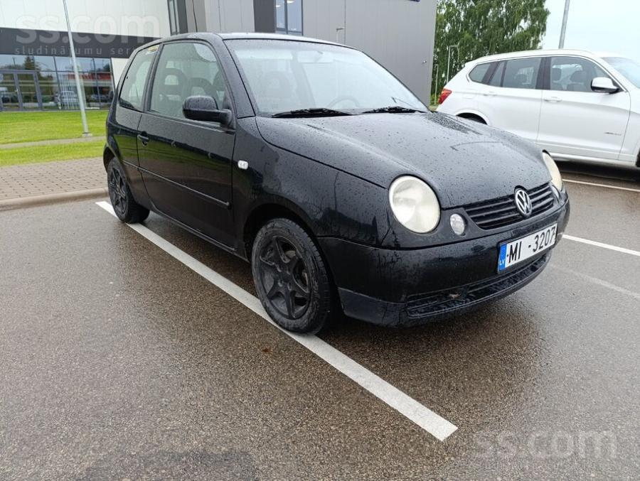 Black Volkswagen Lupo 2001 in Jekabpils, with an engine capacity of 1.40 L and mileage of 204 thousand km for 980 €, photo 1 on AUTOMOTO.COM.LV