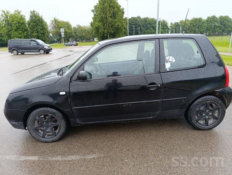 Black Volkswagen Lupo 2001 in Jekabpils, with an engine capacity of 1.40 L and mileage of 204 thousand km for 980 €, photo 3 on AUTOMOTO.COM.LV