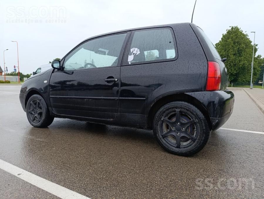 Black Volkswagen Lupo 2001 in Jekabpils, with an engine capacity of 1.40 L and mileage of 204 thousand km for 980 €, photo 4 on AUTOMOTO.COM.LV