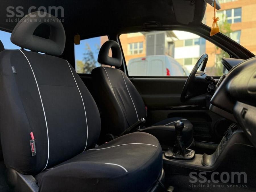 Black Volkswagen Lupo 2003 in Riga, with an engine capacity of 1.00 L and mileage of 0 thousand km for 1400 €, photo 7 on AUTOMOTO.COM.LV