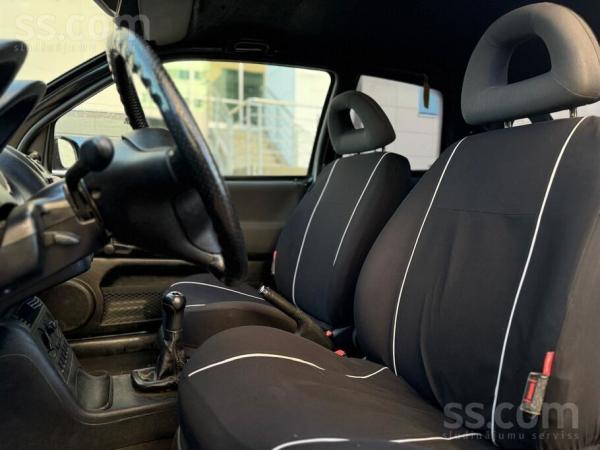 Black Volkswagen Lupo 2003 in Riga, with an engine capacity of 1.00 L and mileage of 0 thousand km for 1400 €, photo 9 on AUTOMOTO.COM.LV