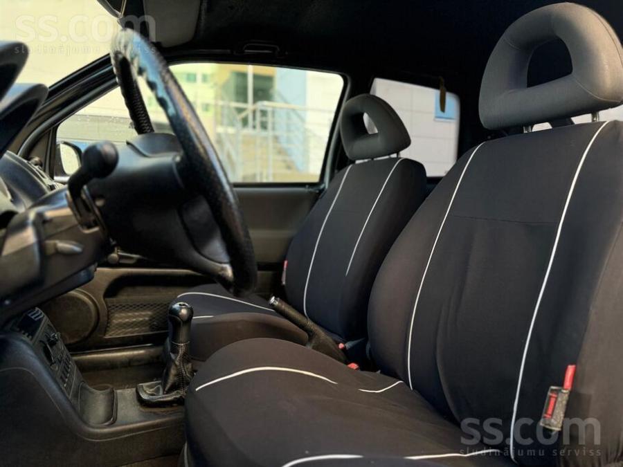 Black Volkswagen Lupo 2003 in Riga, with an engine capacity of 1.00 L and mileage of 0 thousand km for 1400 €, photo 9 on AUTOMOTO.COM.LV