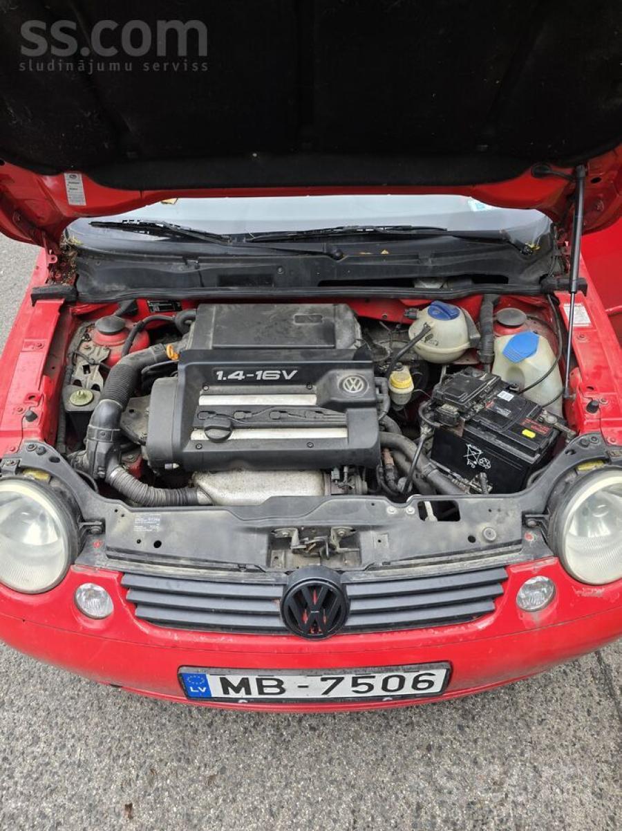 Sarkans Volkswagen Lupo 2000 Jūrmala, ar dzinēja tilpumu 1.40 L un nobraukumu 275 tūkst. km par 800 €, foto 2 vietnē AUTOMOTO.COM.LV