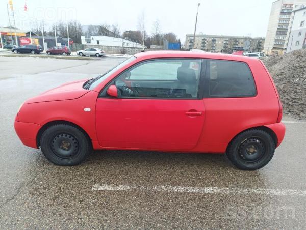 Red Volkswagen Lupo 2000 in Riga, with an engine capacity of 1.40 L and mileage of 392 thousand km for 950 €, photo 3 on AUTOMOTO.COM.LV