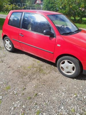Red Volkswagen Lupo 2003 in Riga, with an engine capacity of 1.00 L and mileage of 180 thousand km for 1300 €, photo 4 on AUTOMOTO.COM.LV