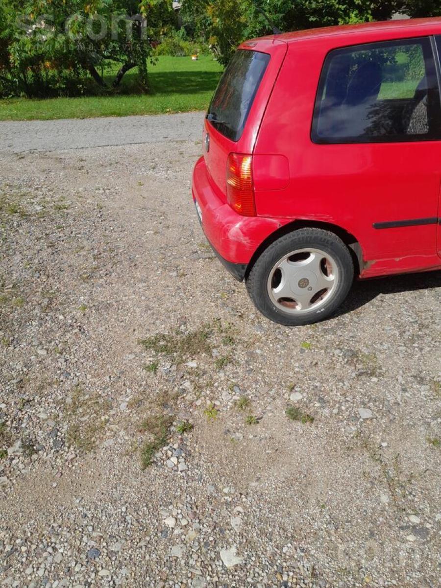 Red Volkswagen Lupo 2003 in Riga, with an engine capacity of 1.00 L and mileage of 180 thousand km for 1300 €, photo 5 on AUTOMOTO.COM.LV