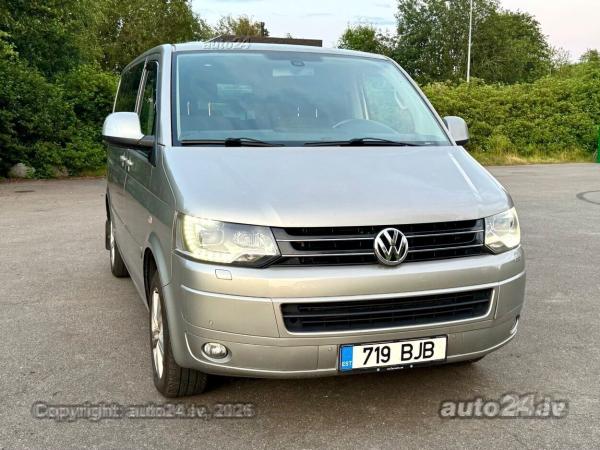 Smilšu krāsa Volkswagen Multivan 2012 Tallina, ar dzinēja tilpumu 2.00 L un nobraukumu 239 tūkst. km par 13900 €, foto 6 vietnē AUTOMOTO.COM.LV