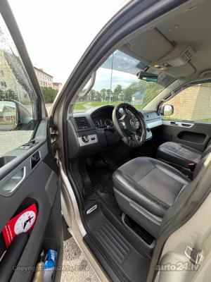 Beige Volkswagen Multivan 2012 in Tallinn, with an engine capacity of 2.00 L and mileage of 247 thousand km for 17200 €, photo 10 on AUTOMOTO.COM.LV