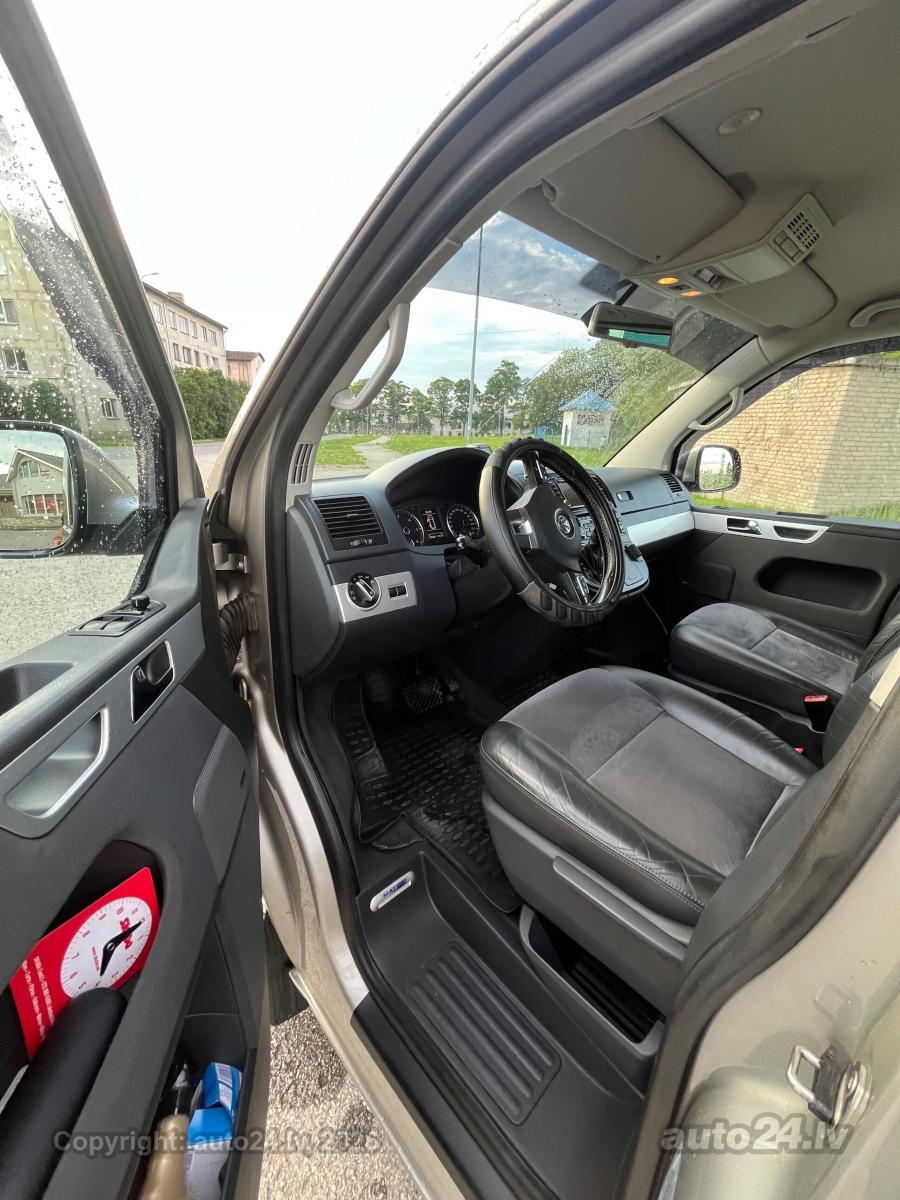 Beige Volkswagen Multivan 2012 in Tallinn, with an engine capacity of 2.00 L and mileage of 247 thousand km for 17200 €, photo 10 on AUTOMOTO.COM.LV